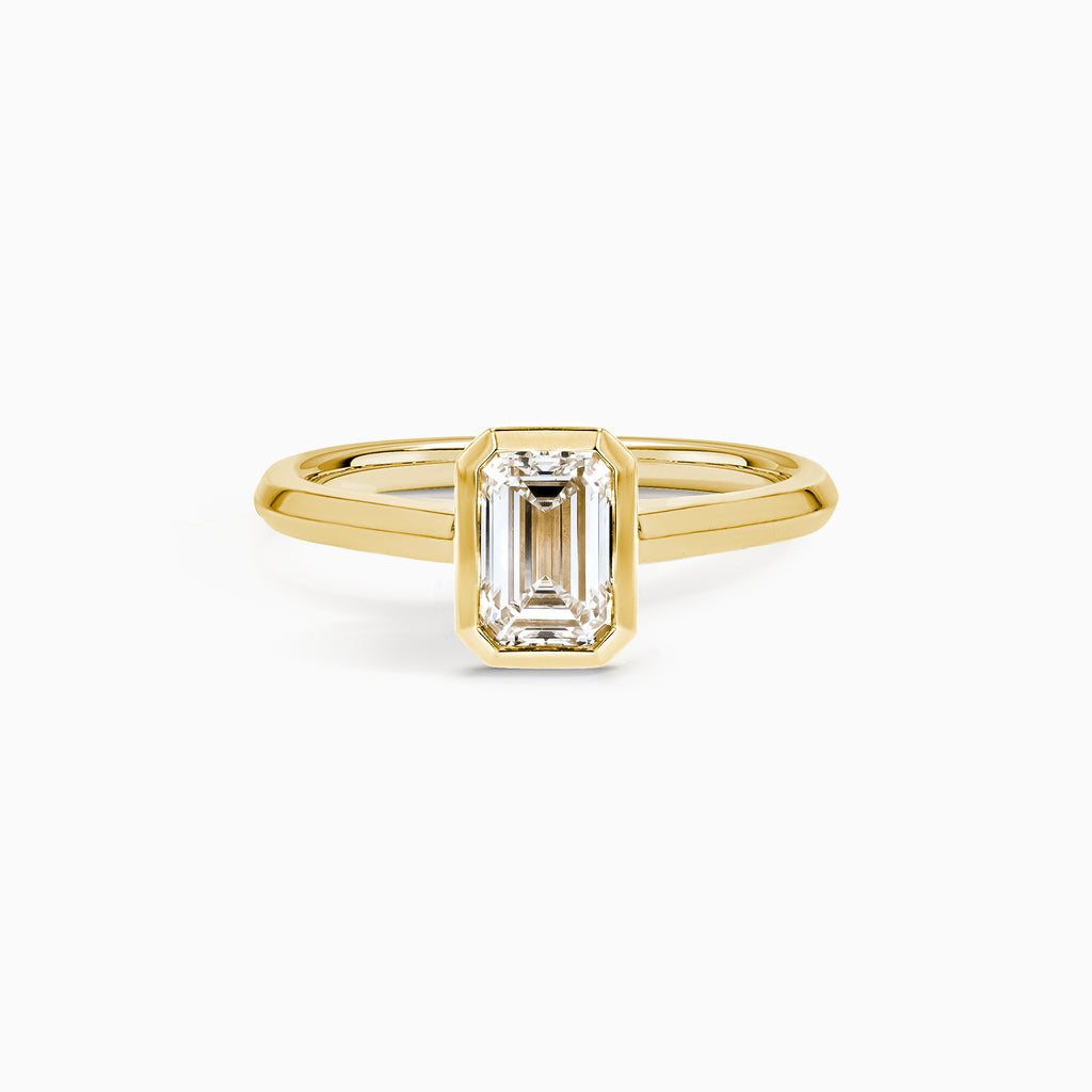 Solara Emerald-Cut Bezel Diamond Ring in 18K Yellow Gold – Compositions